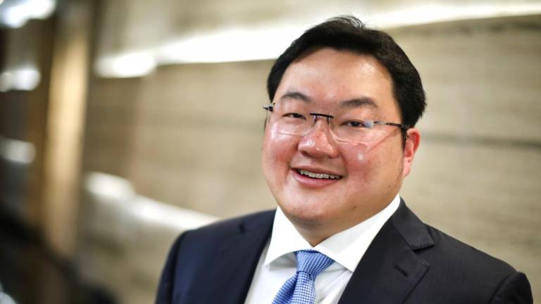 Millions seized from 1MDB fugitive financier Jho Low’s father’s